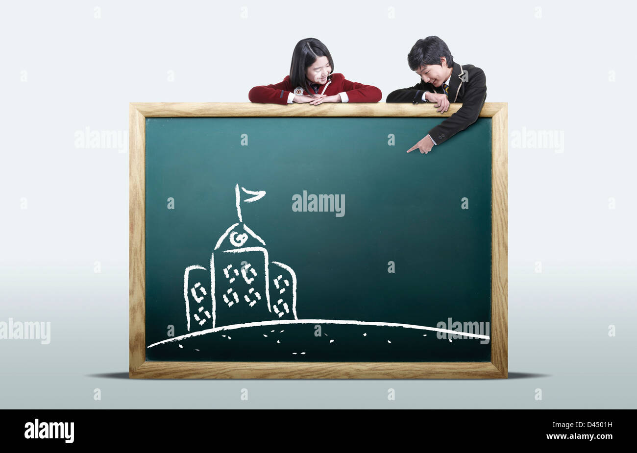 students behind a blackboard Stock Photo - Alamy