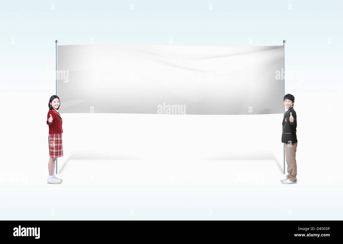 students holding empty card Stock Photo - Alamy