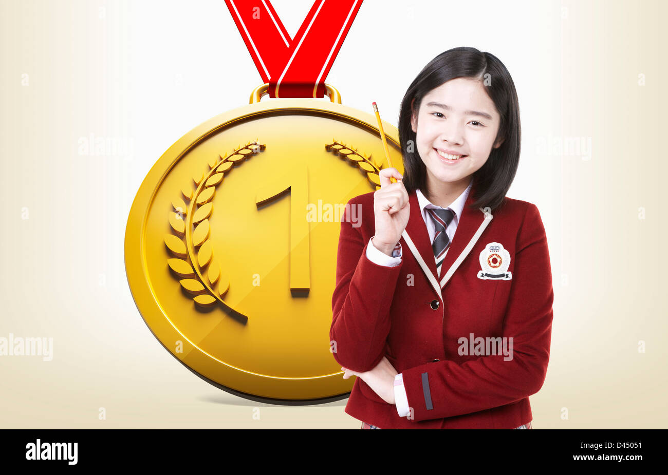 a student in front of a medal Stock Photo - Alamy