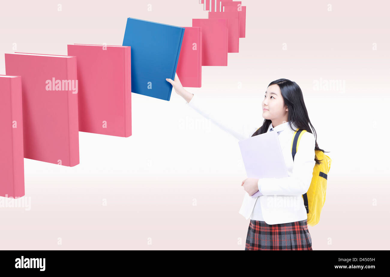 Picking a book hi-res stock photography and images - Alamy