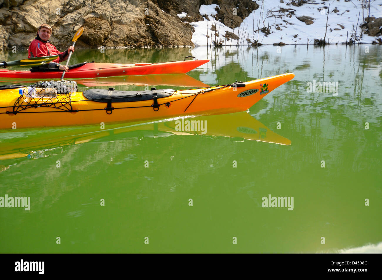 Winter canoe paddling on icy waters Stock Photo - Alamy