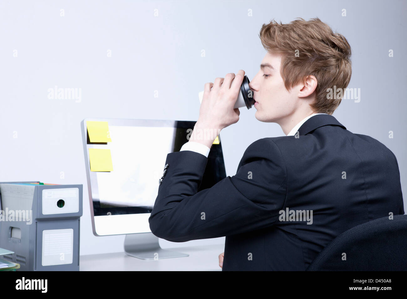 Shot man behind computer hi-res stock photography and images - Alamy