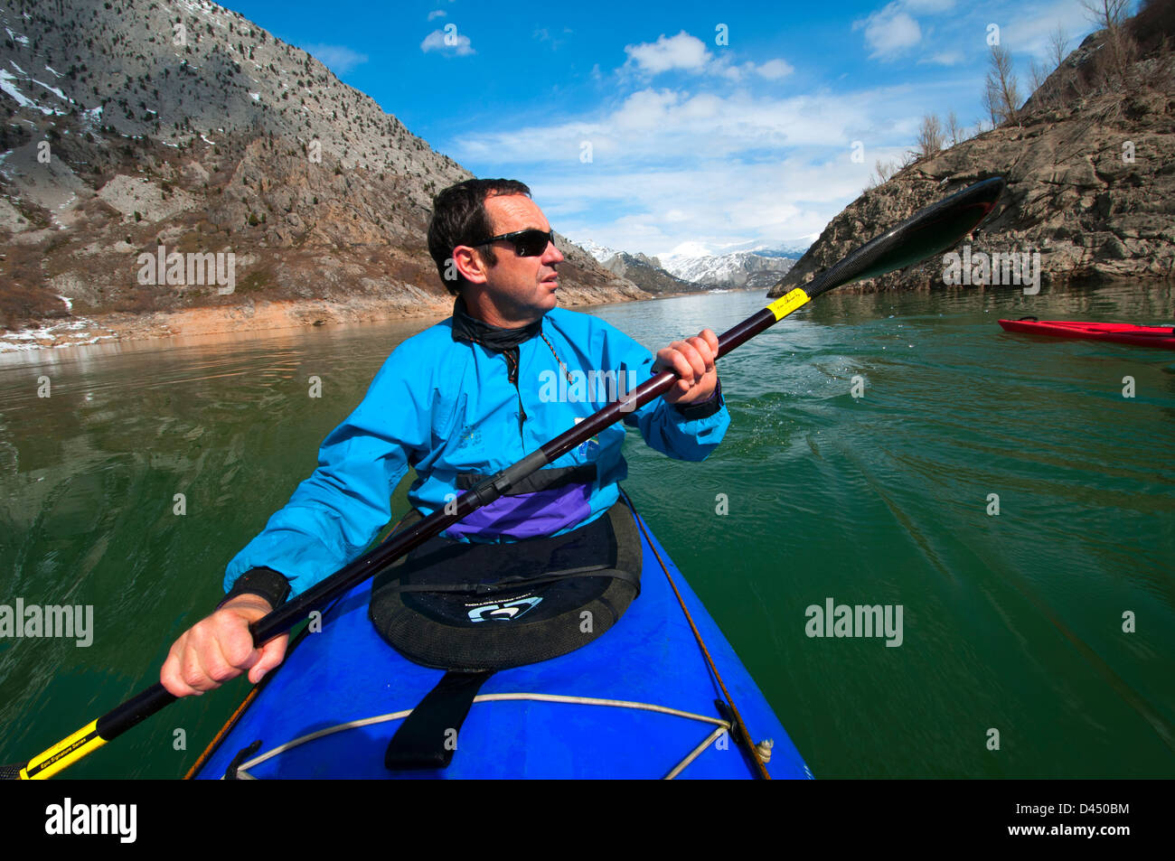 Winter canoe paddling on icy waters Stock Photo - Alamy