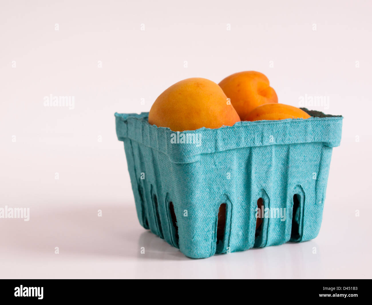 The apricot fruit is a drupe similar to a small peach, from yellow to ...