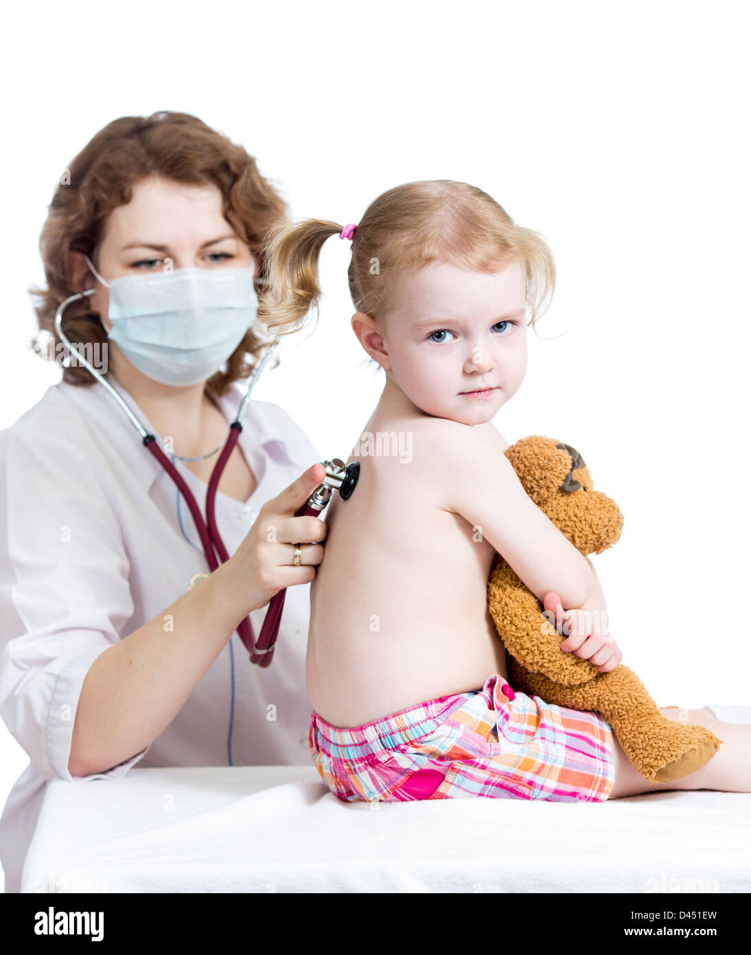 doctor examining kid girl isolated on white Stock Photo - Alamy