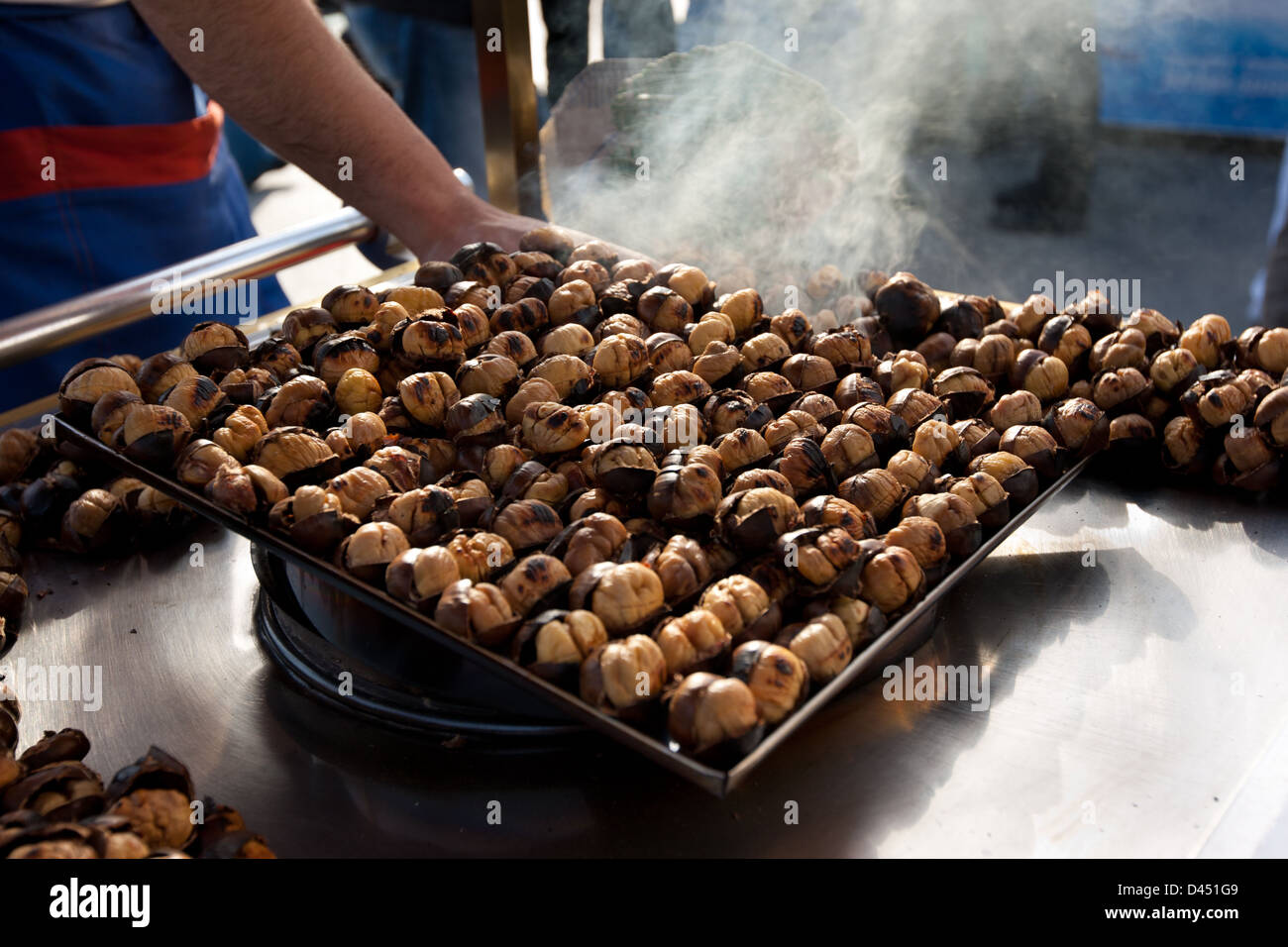 Traditional roast chestnut stall hi-res stock photography and images ...