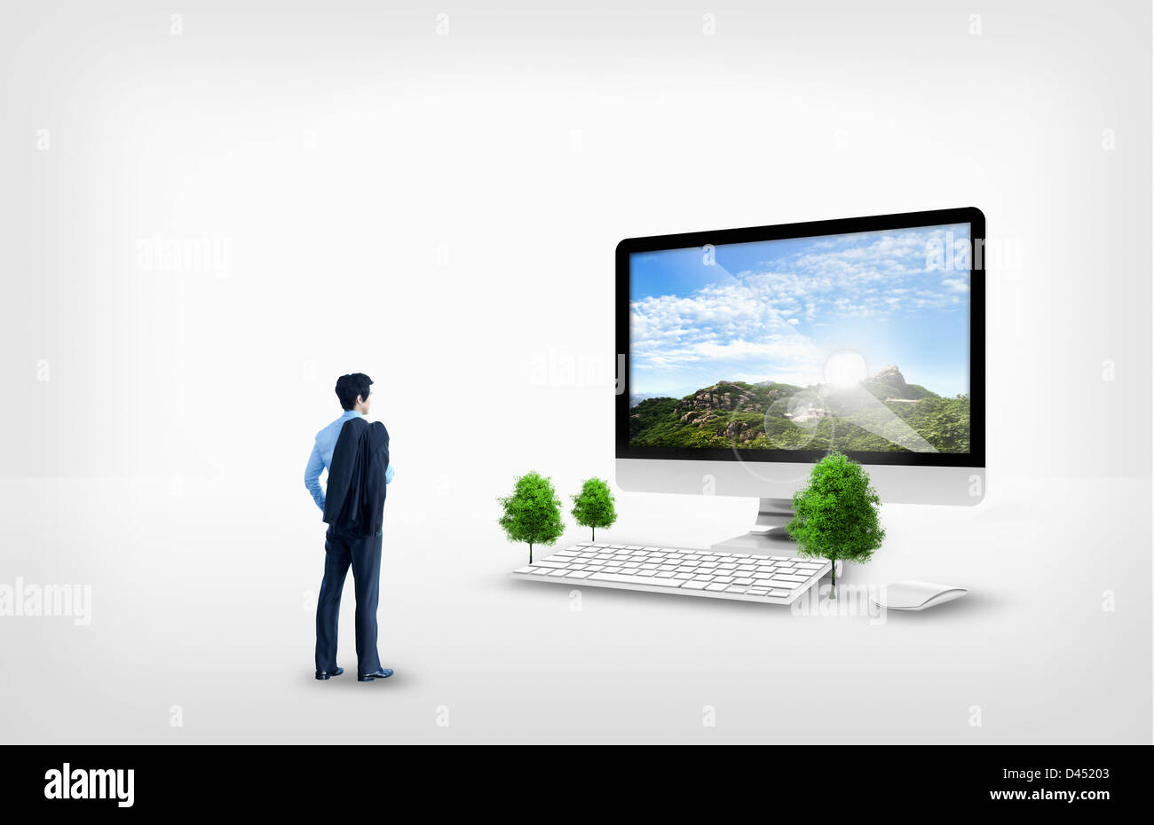 businessman standing in front of a huge computer Stock Photo - Alamy