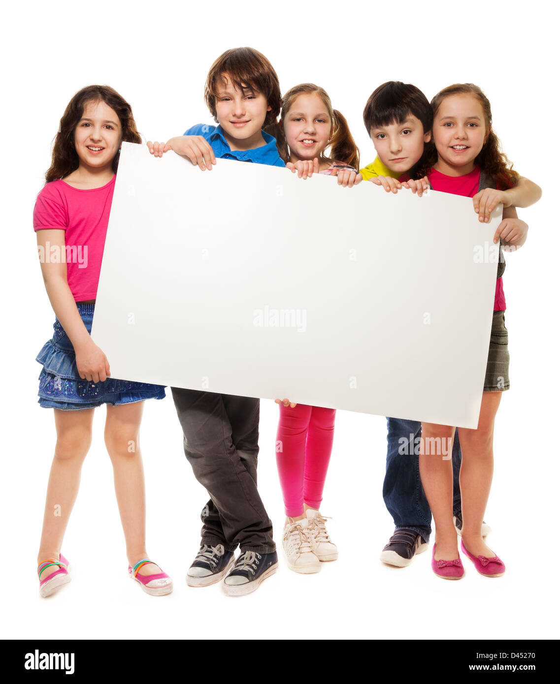 Group of school aged teen boys and girls, showing blank placard board ...