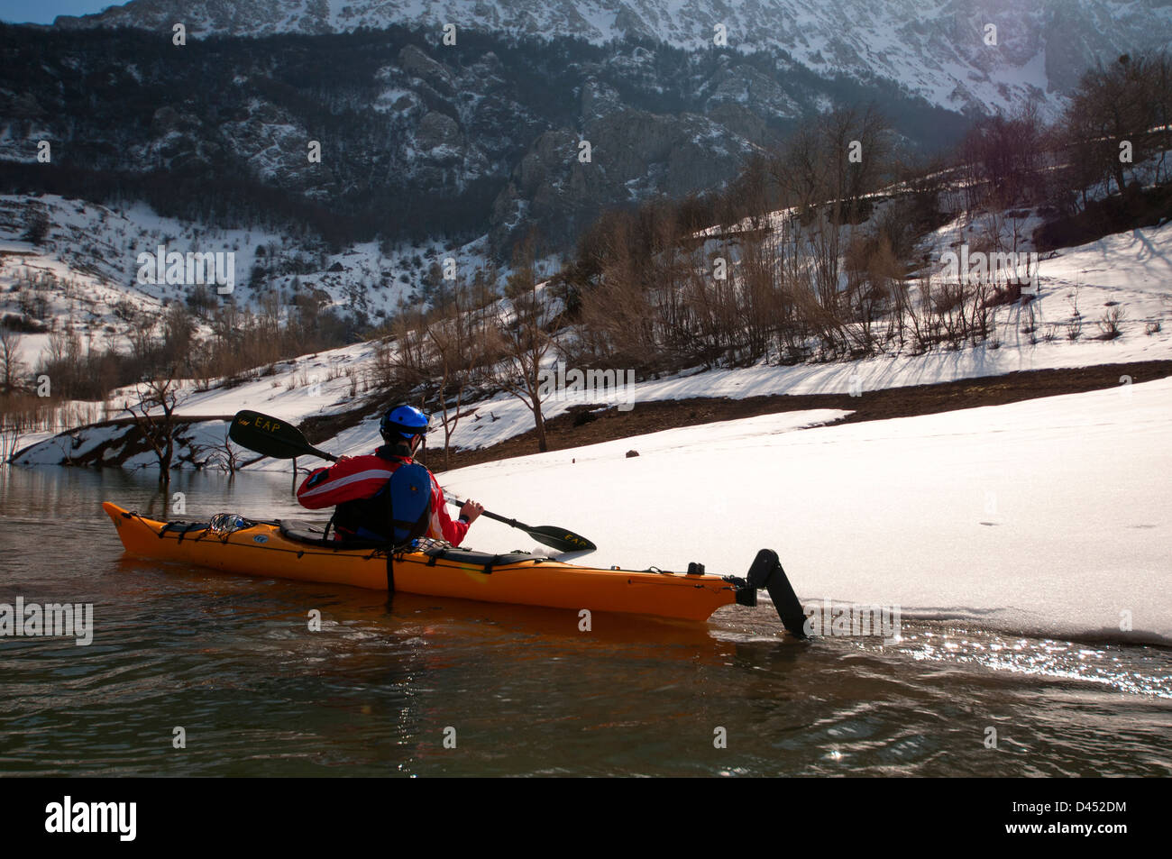 Winter canoe paddling on icy waters Stock Photo - Alamy