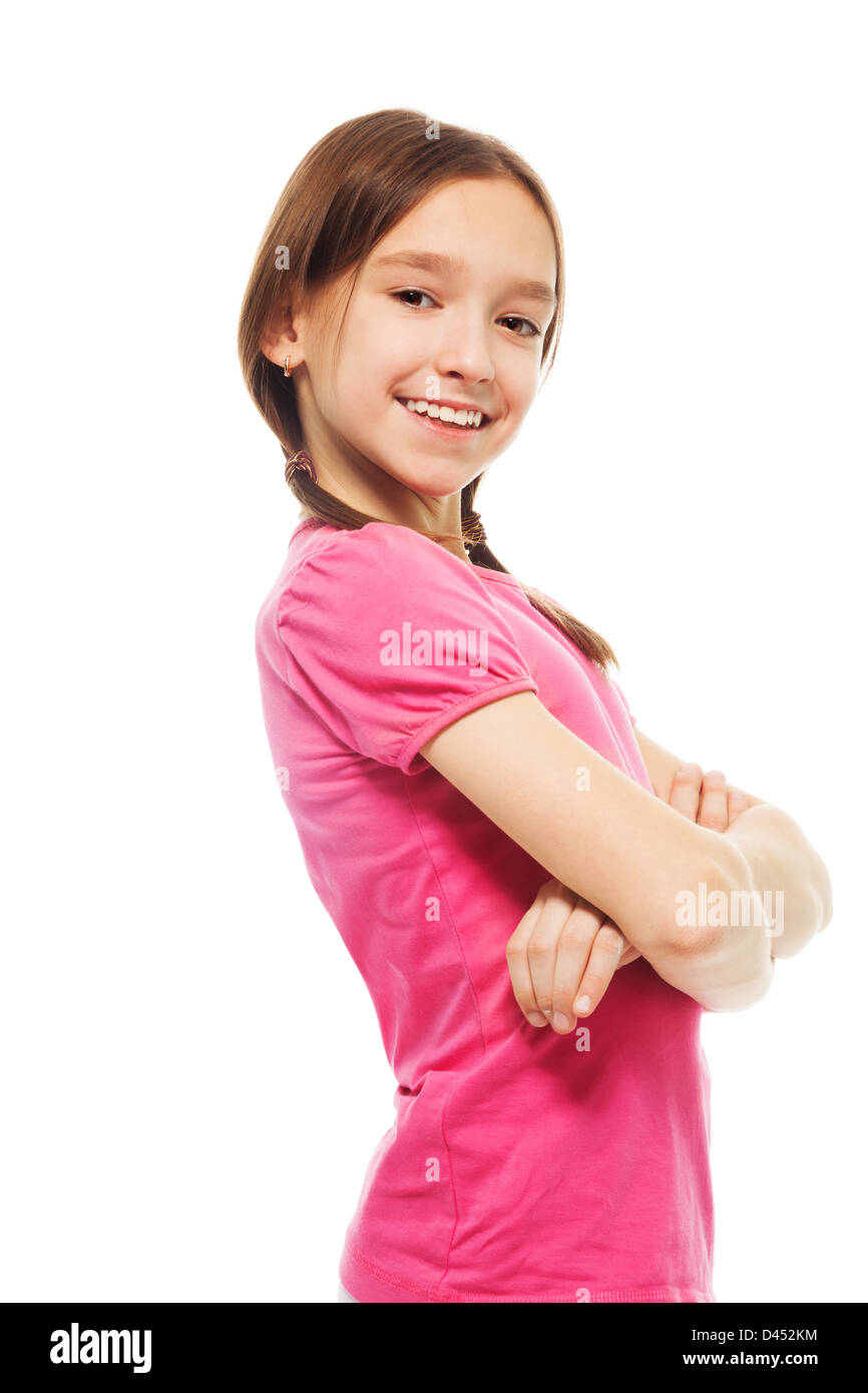 Portrait of cute, smiling, confident 9 years old girl with ponytails ...