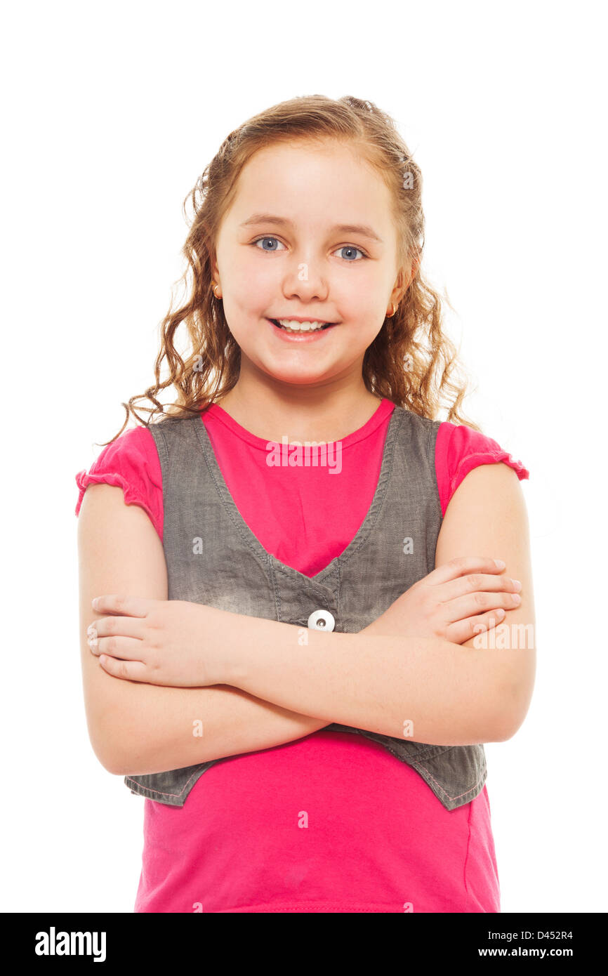 Portrait of happy, smiling, confident 9 years old girl with curly hair, isolated on white Stock ...