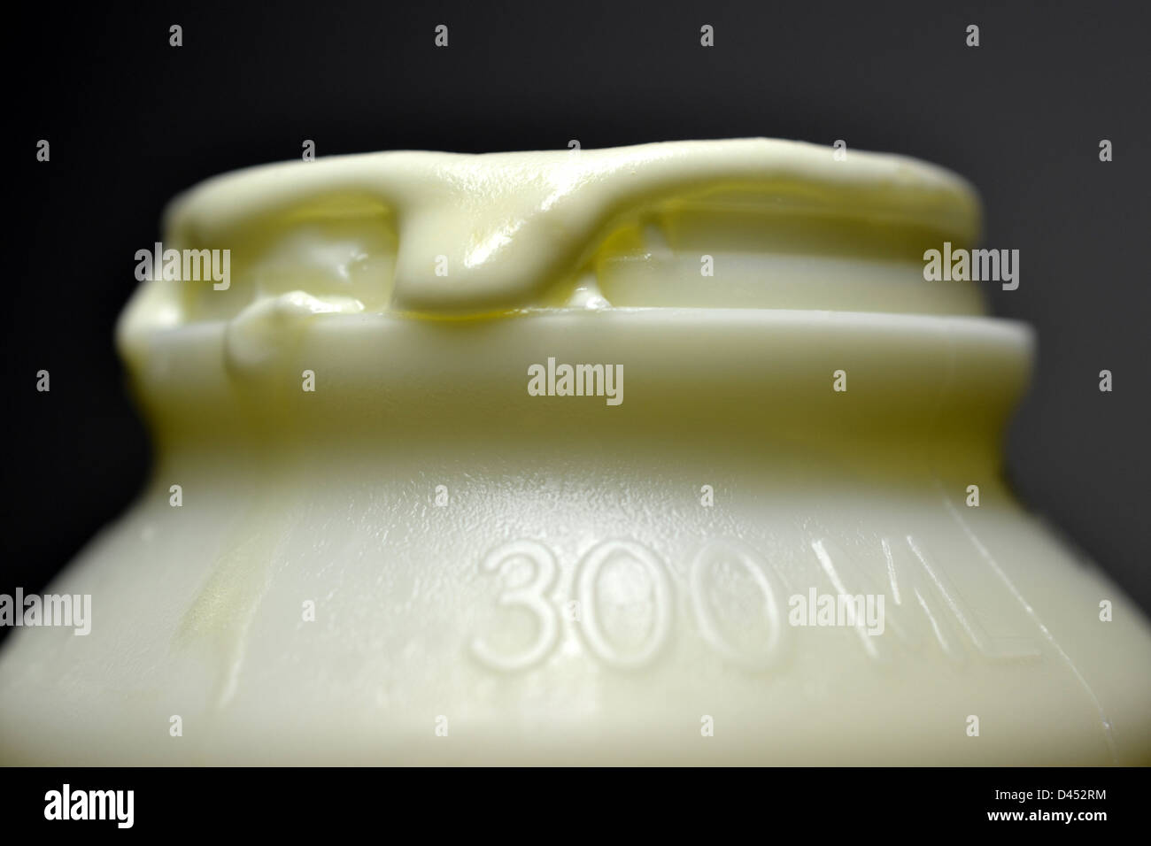 empty 300ml thickened cream container Stock Photo - Alamy