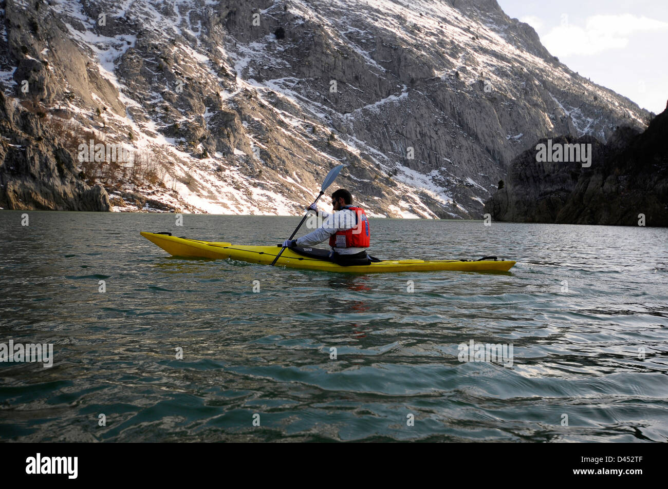 Winter canoe paddling on icy waters Stock Photo - Alamy