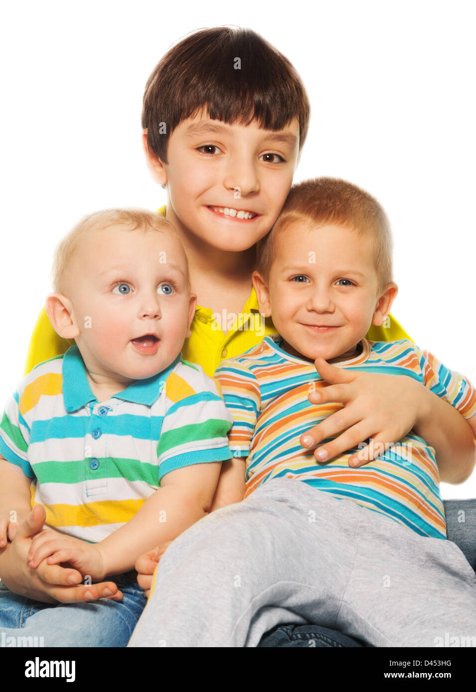 Bigger brother holding his little younger brothers Stock Photo - Alamy