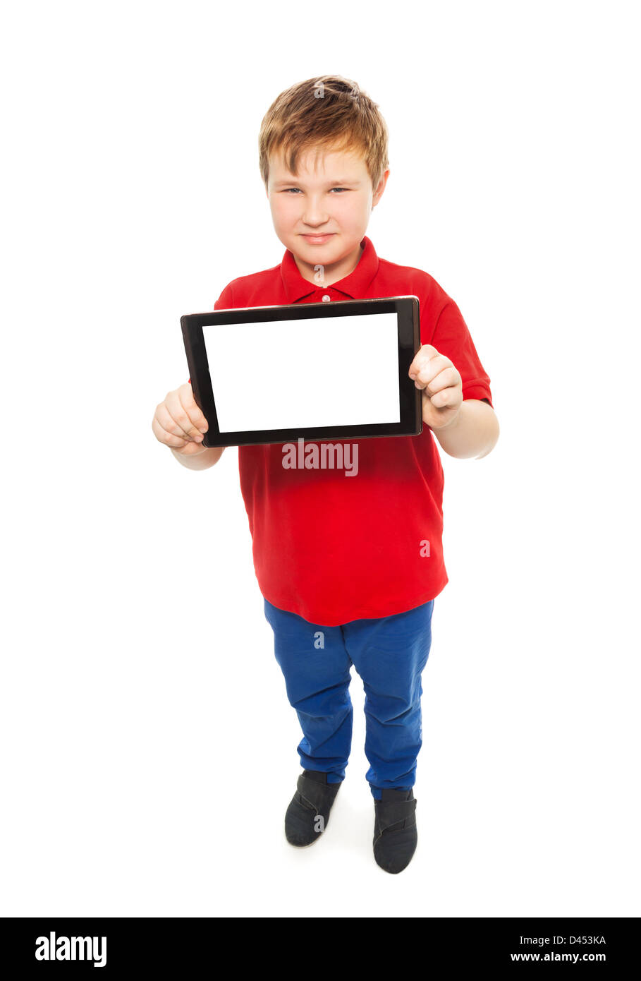 Smart Caucasian 10 years old boy showing digital tablet computer ...