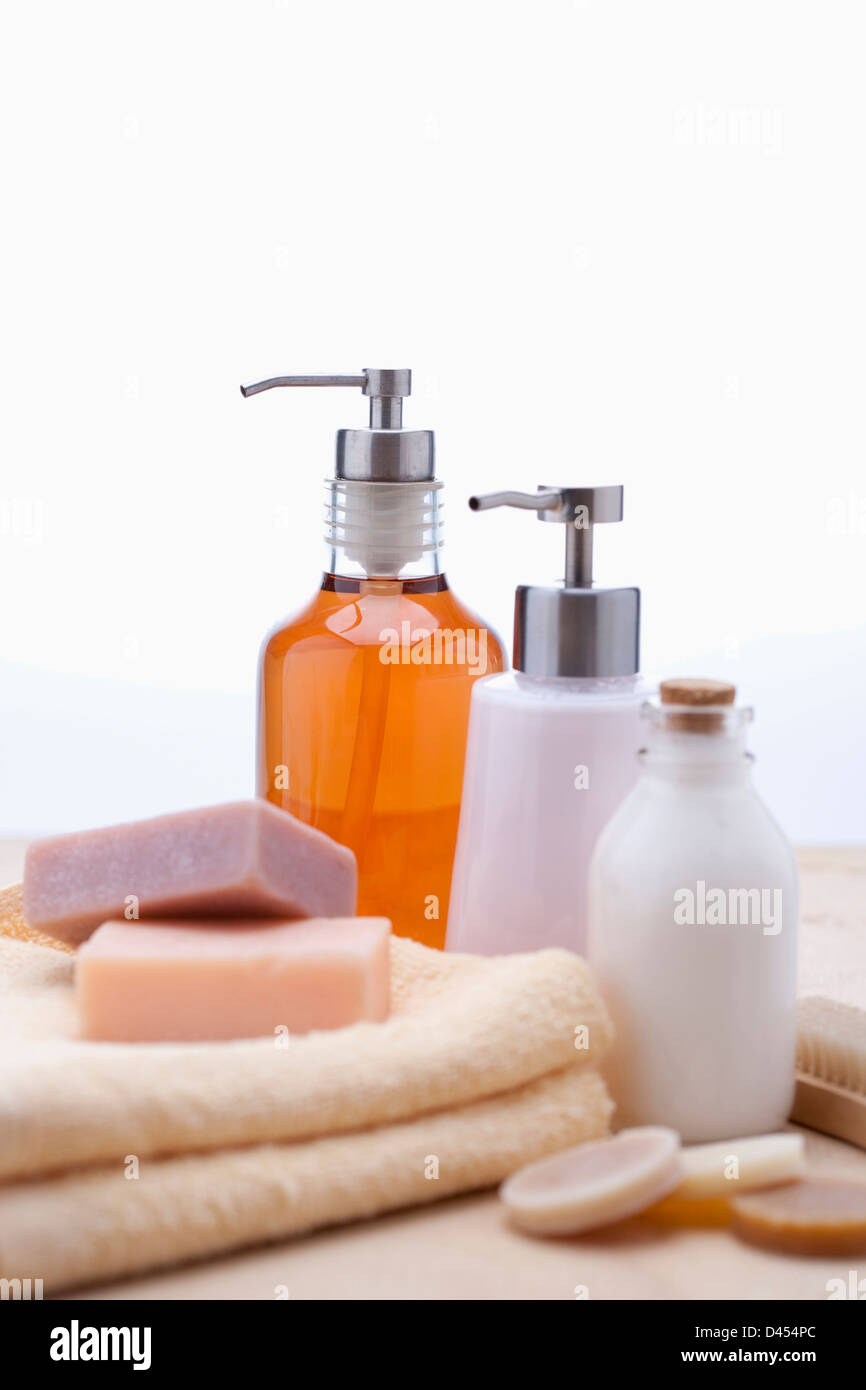 fresh image of bath items including bottles and towel Stock Photo - Alamy