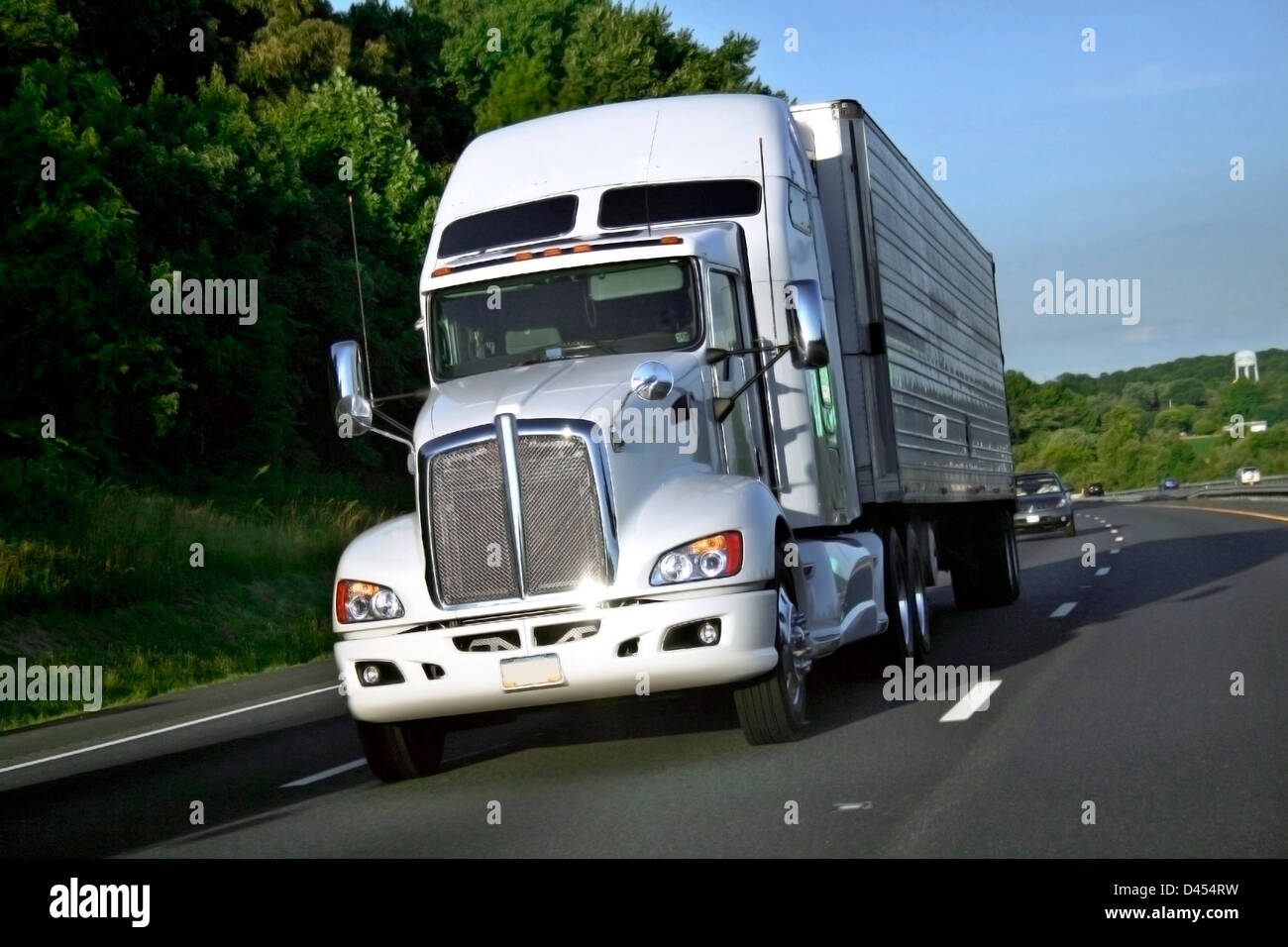 Big truck of load in movement on highway Stock Photo - Alamy