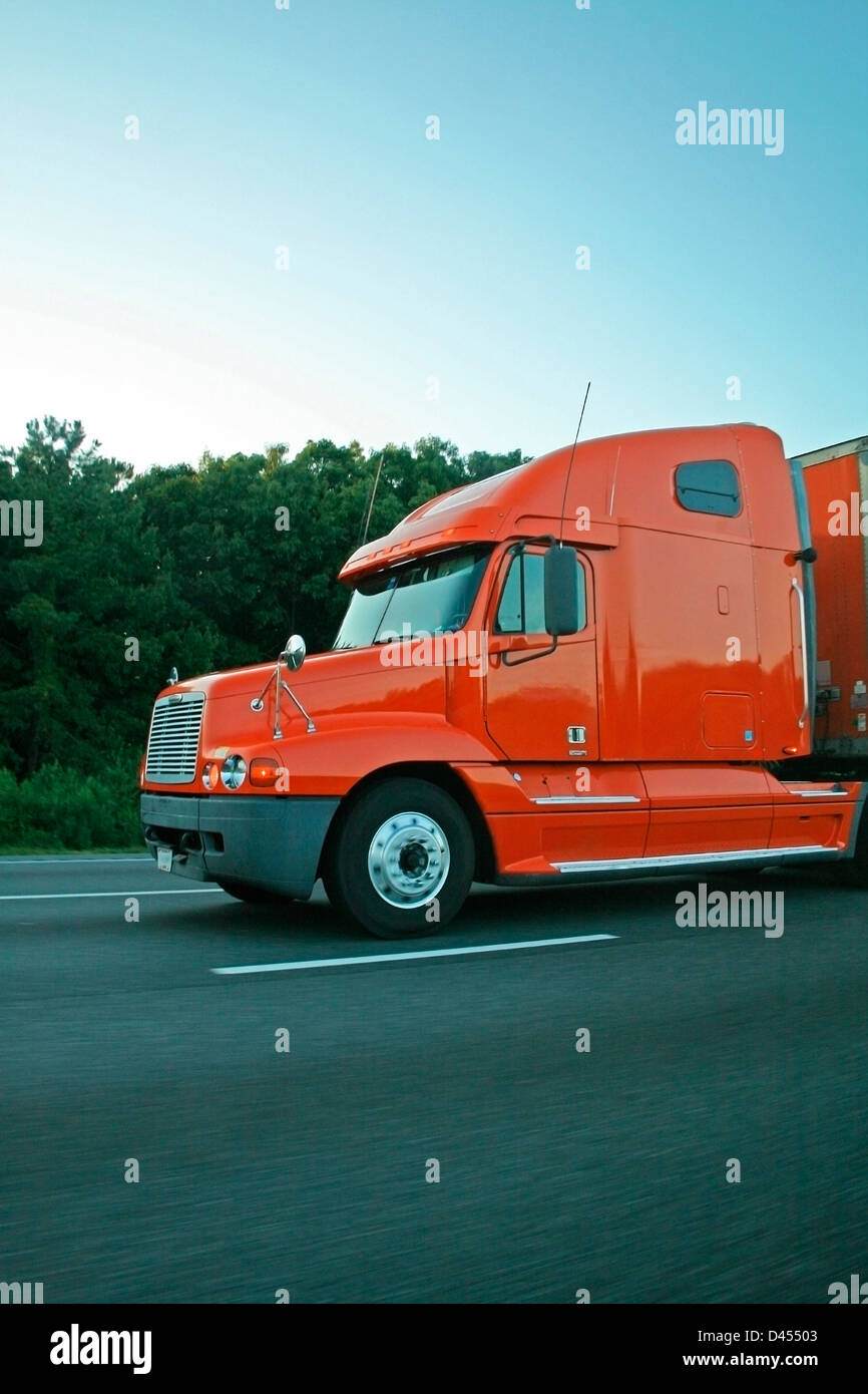 Big truck of load in movement on highway Stock Photo - Alamy