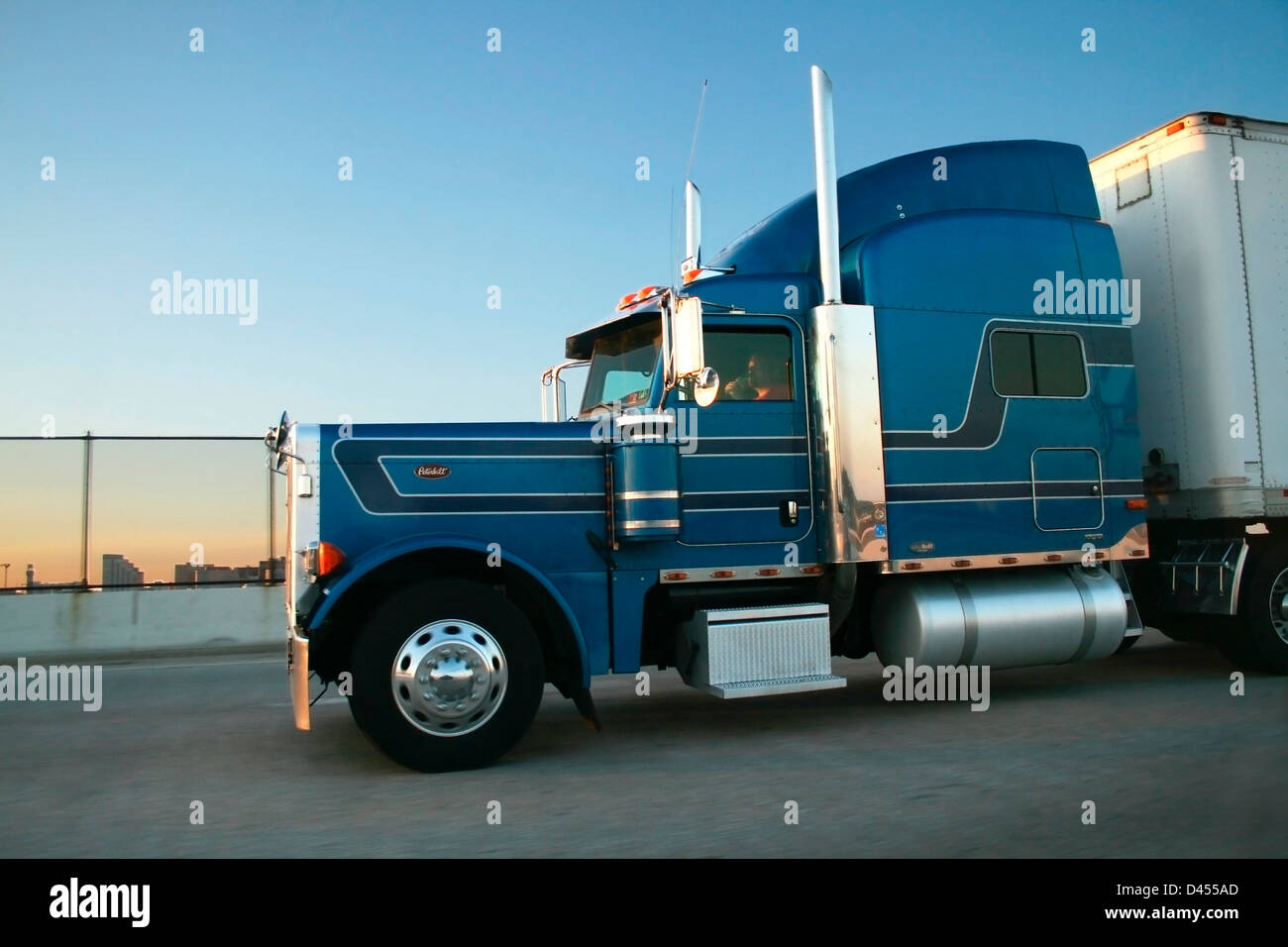 Big truck of load in movement on highway Stock Photo - Alamy