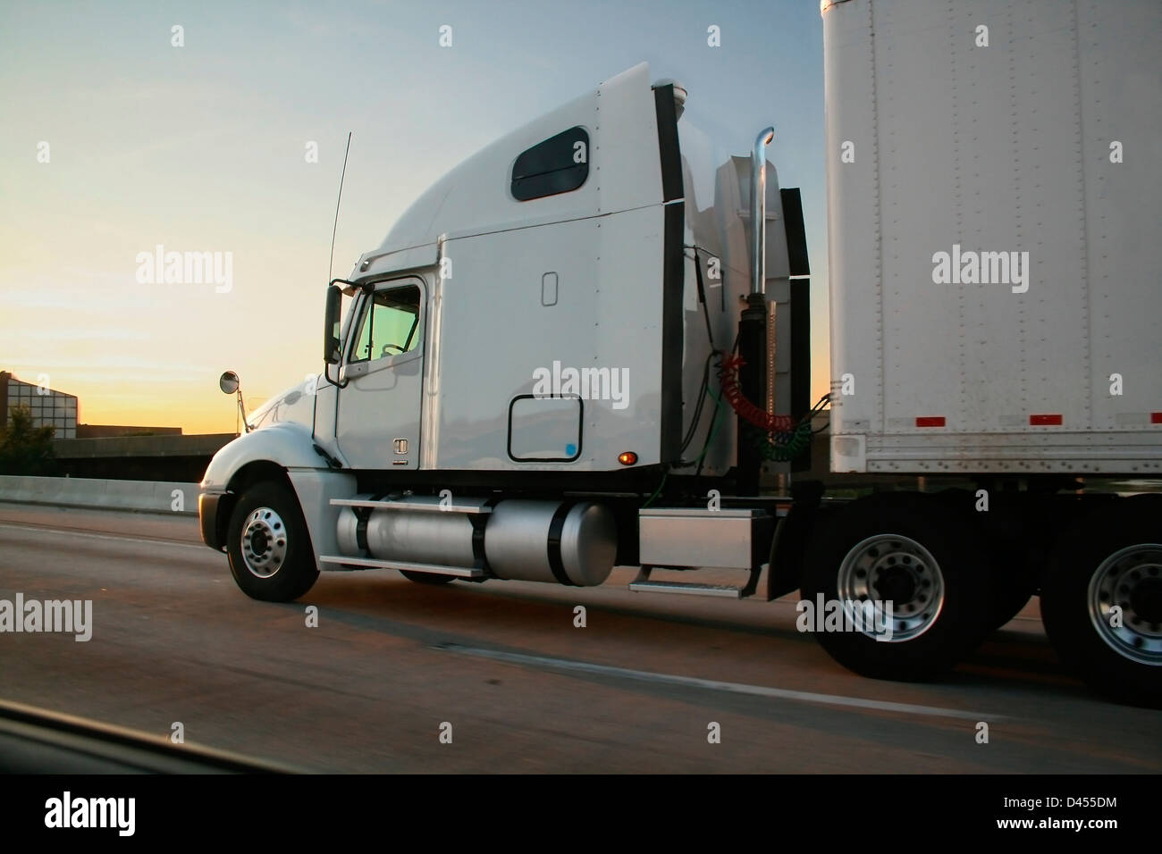Big truck of load in movement on highway Stock Photo - Alamy