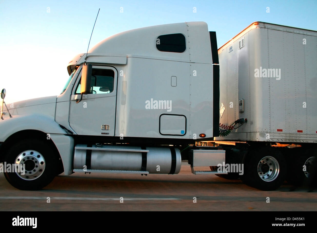 Big truck of load in movement on highway Stock Photo - Alamy