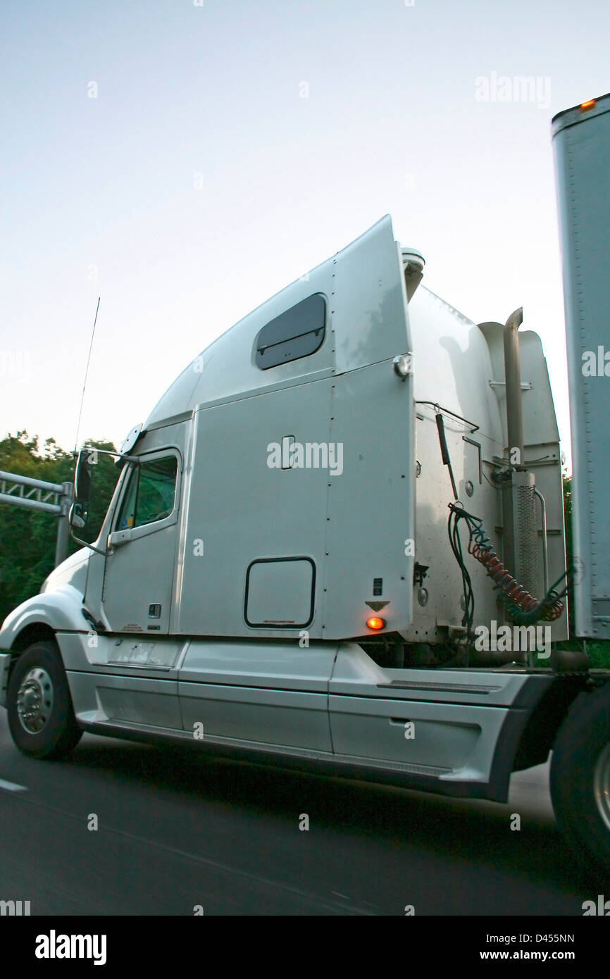 Big truck of load in movement on highway Stock Photo - Alamy