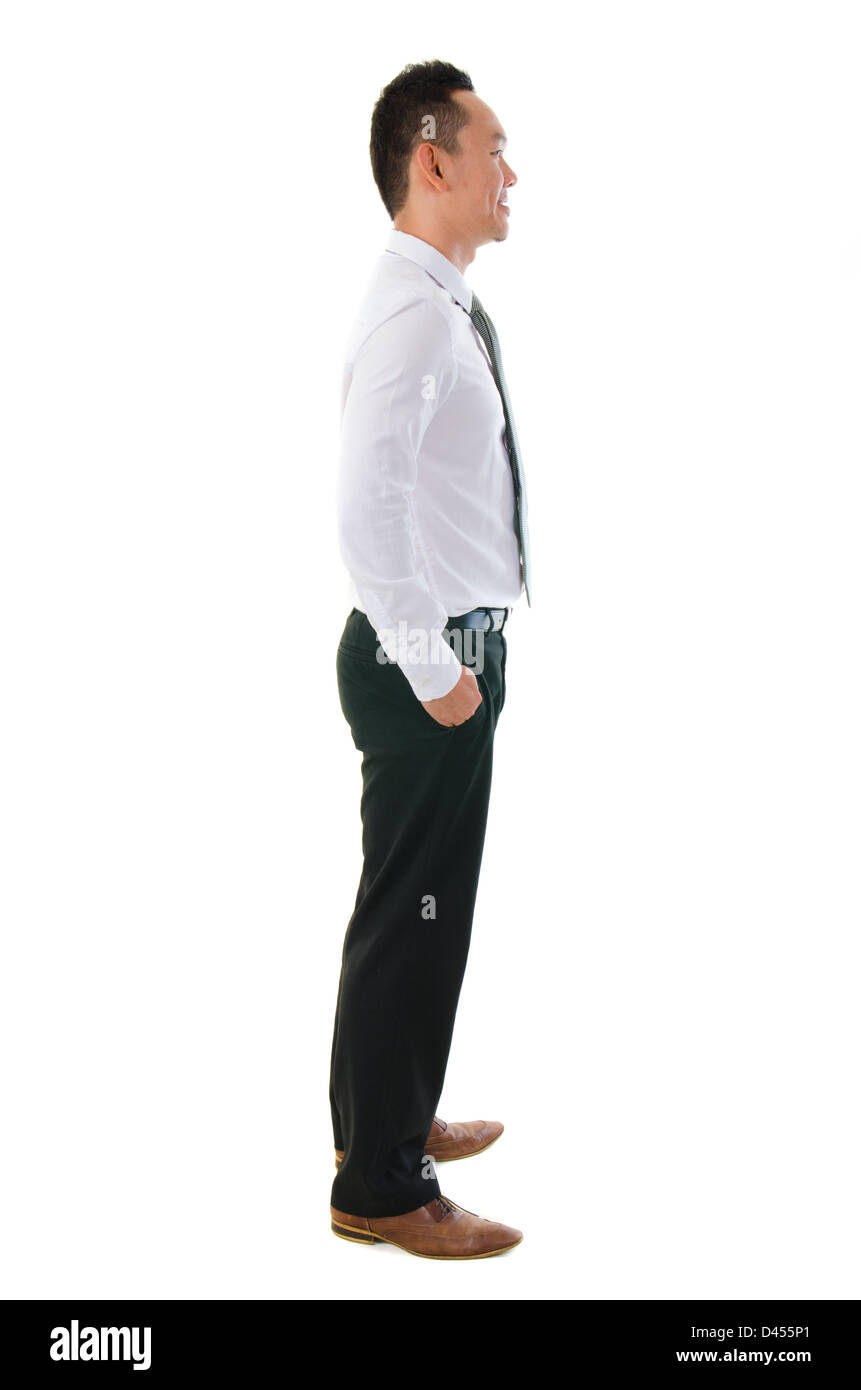 Portrait of smart Chinese Asian business man smiling side view inside ...