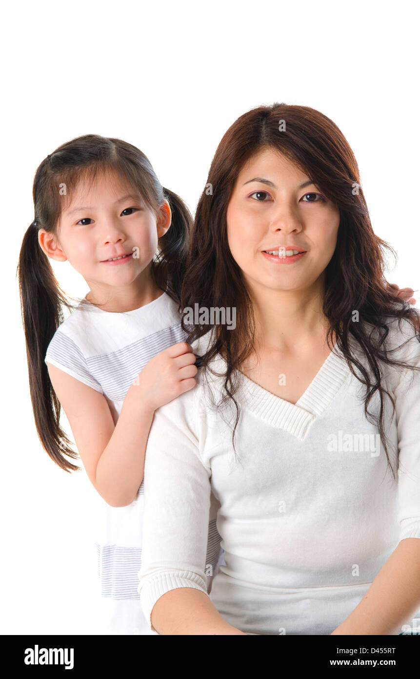 korean mother and her daughter with isolated background Stock Photo - Alamy