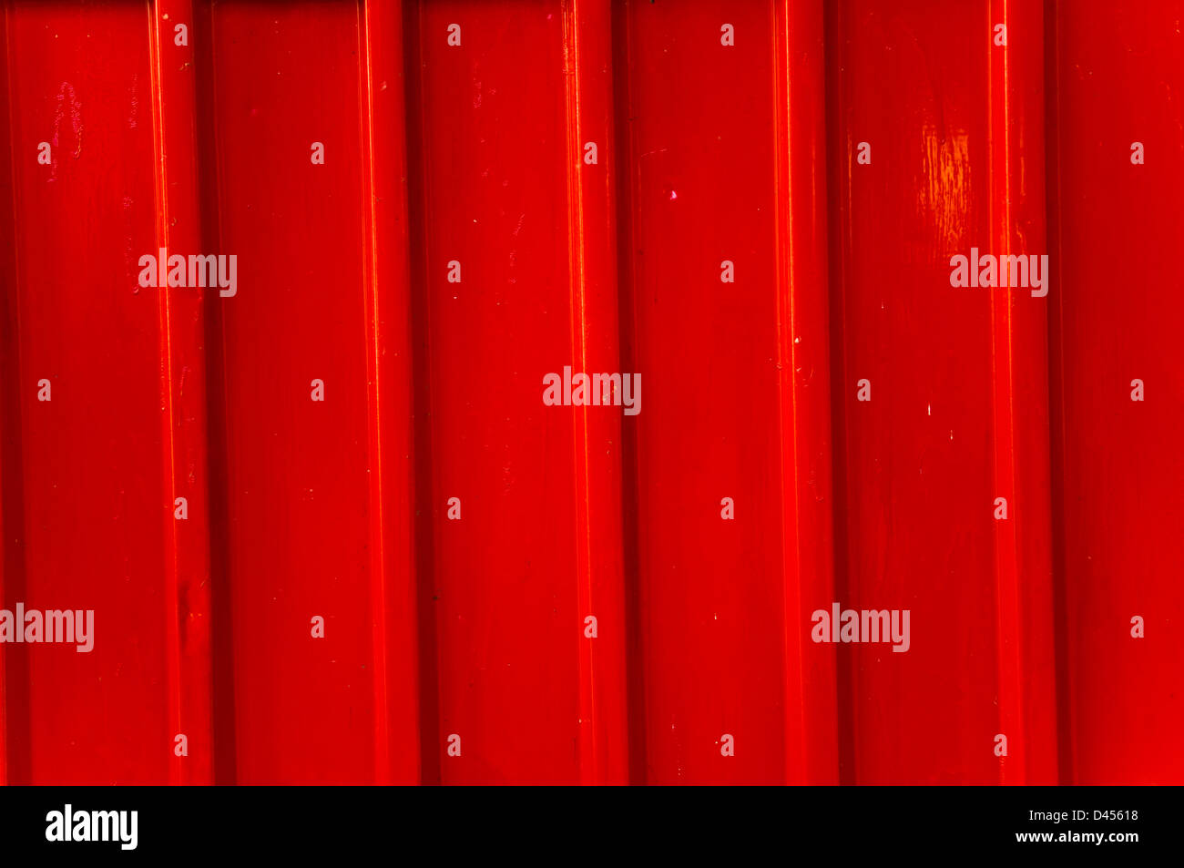 A pattern of a red metal fence Stock Photo - Alamy