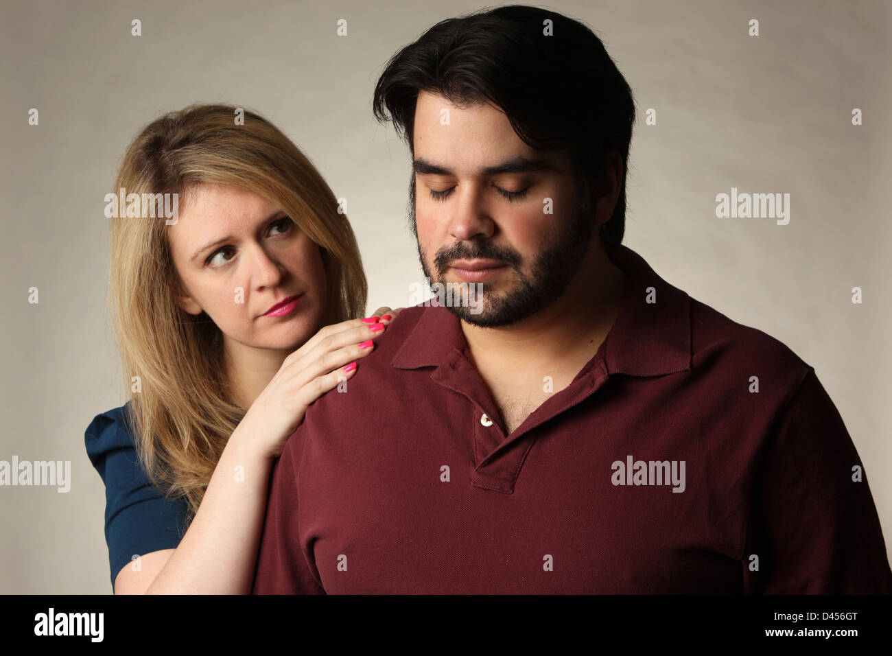 Woman comforts emotionally distressed man, New York, United States ...