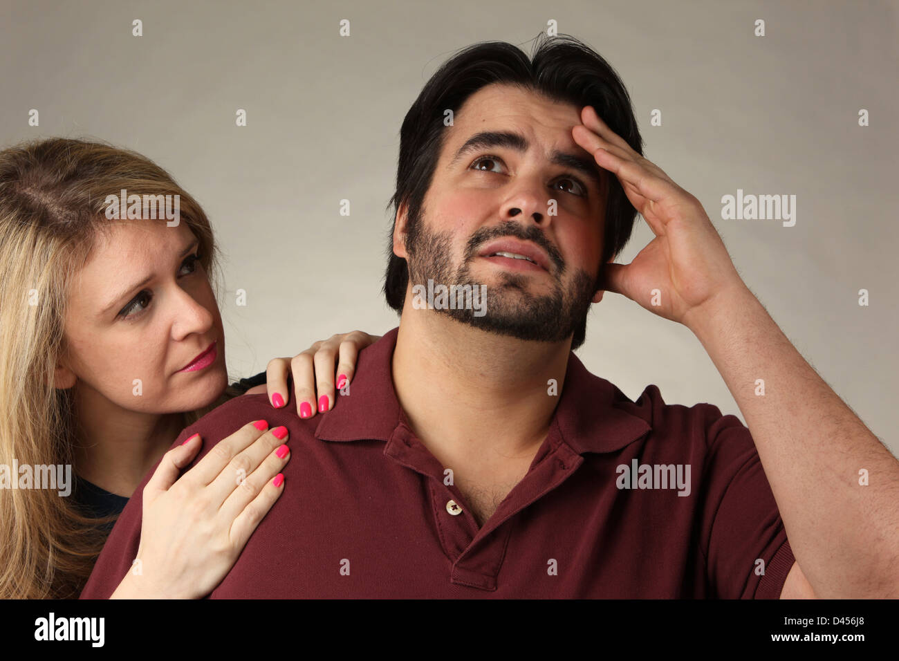 Woman comforts emotionally distressed man, New York, United States ...