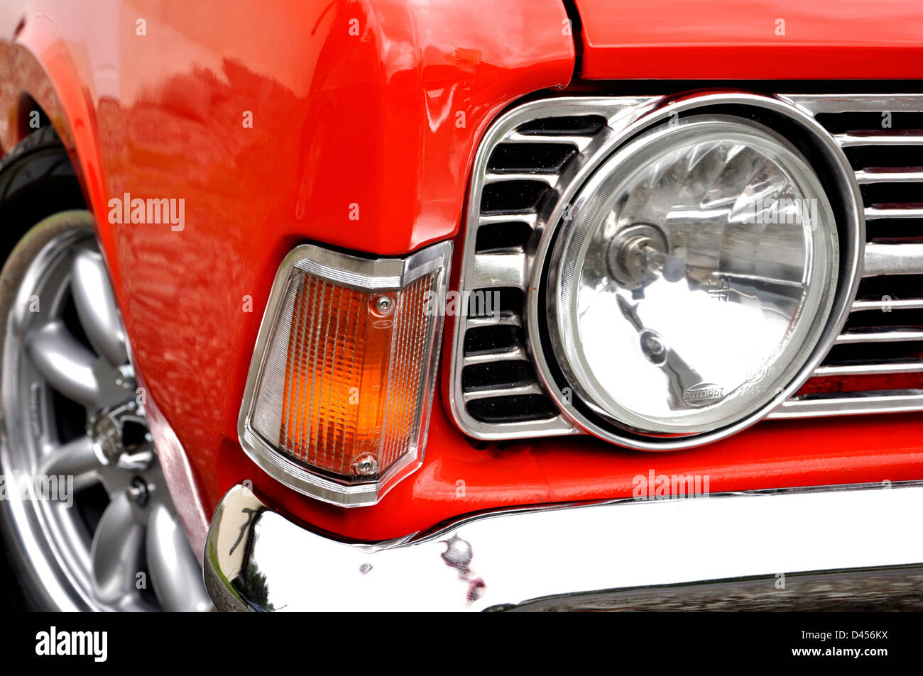 Headlight, indicator and tyre on Cortina Stock Photo - Alamy