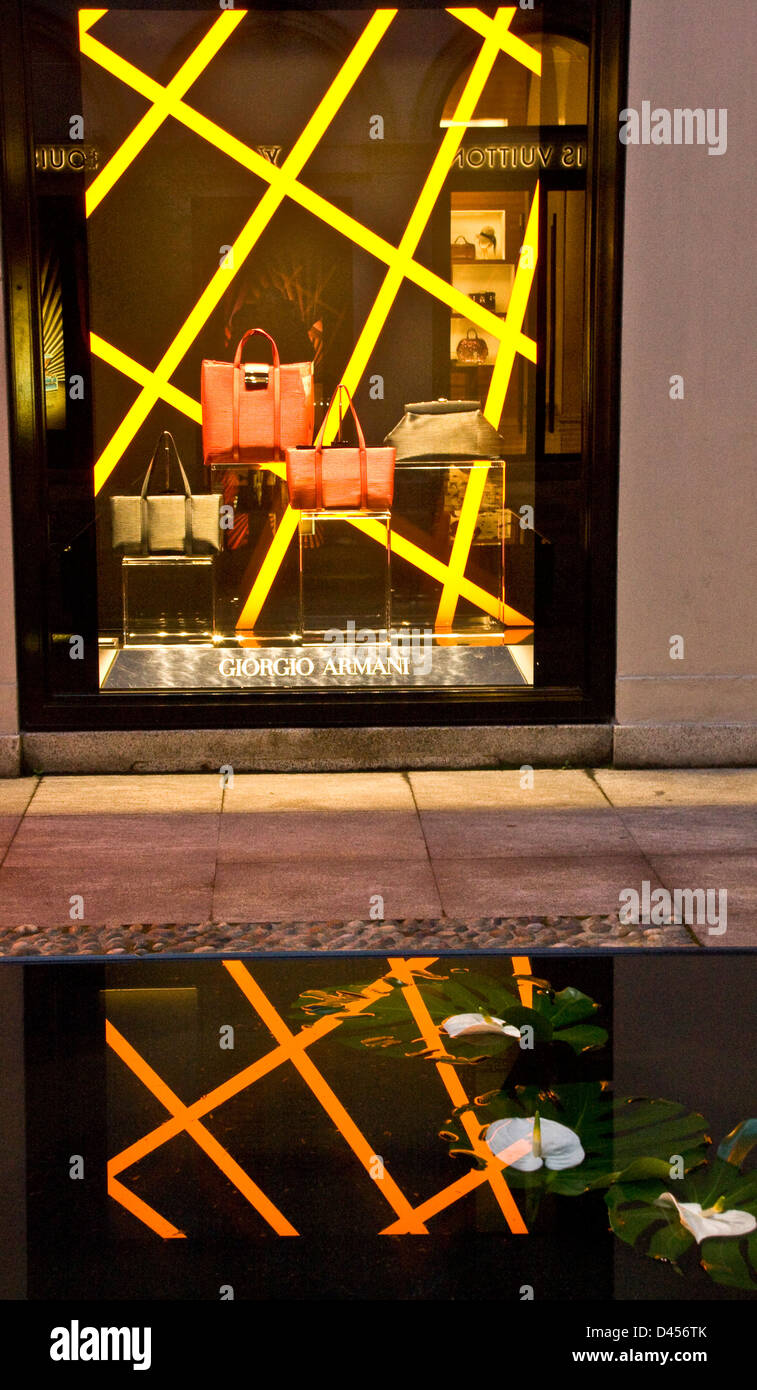 Giorgio Armani boutique designer store illuminated window display and ...