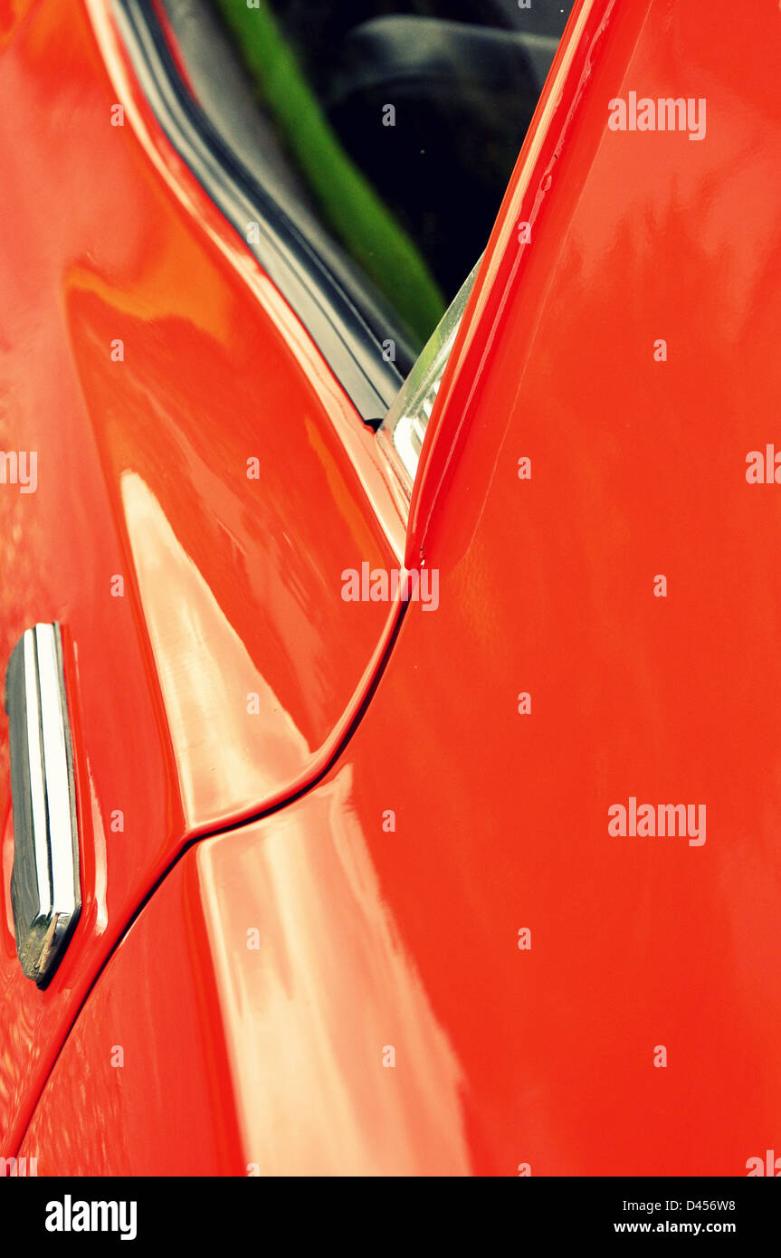 side view of orange car Stock Photo - Alamy