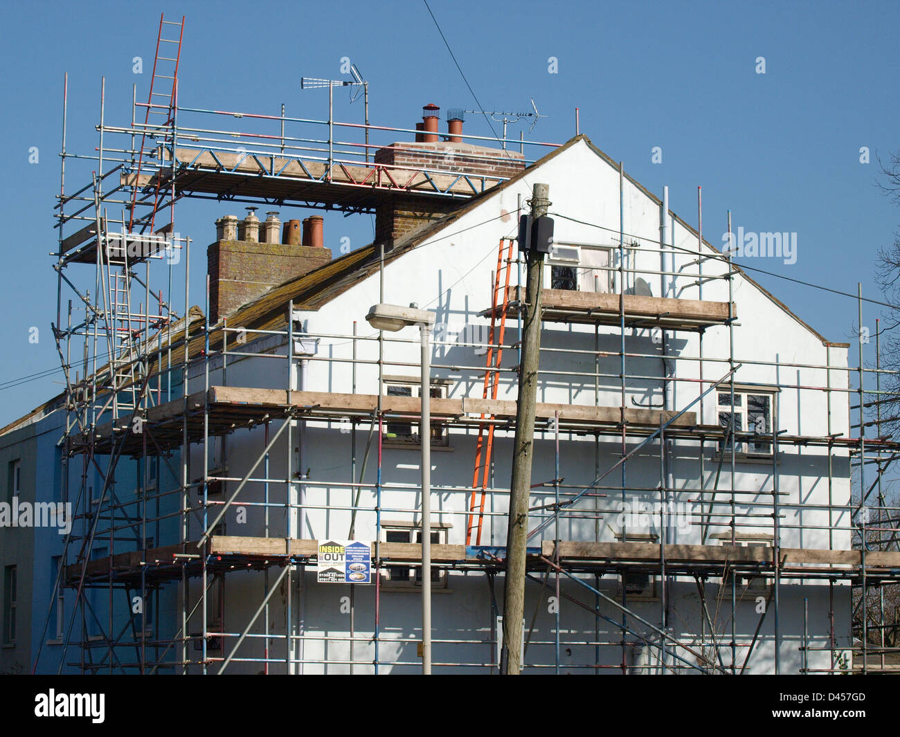top of house with scaffolding Stock Photo - Alamy