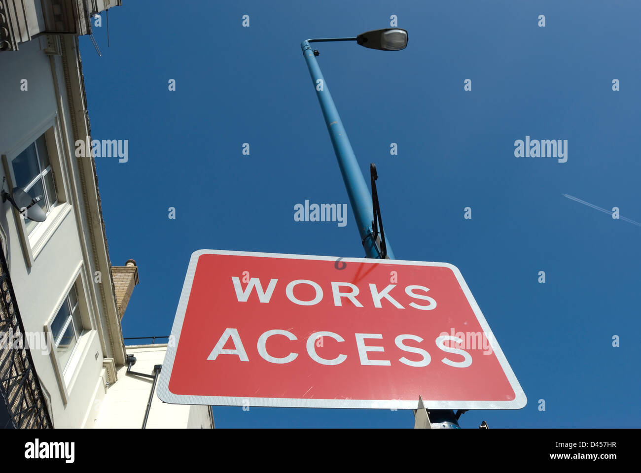 works access sign attached to a lamppost in putney, southwest london ...