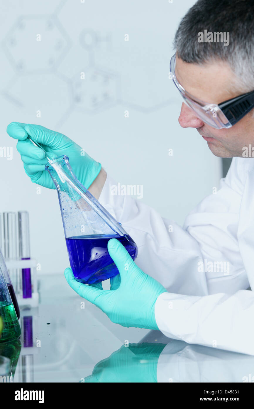 Chemistry Scientist conducting experiments in laboratory Stock Photo ...