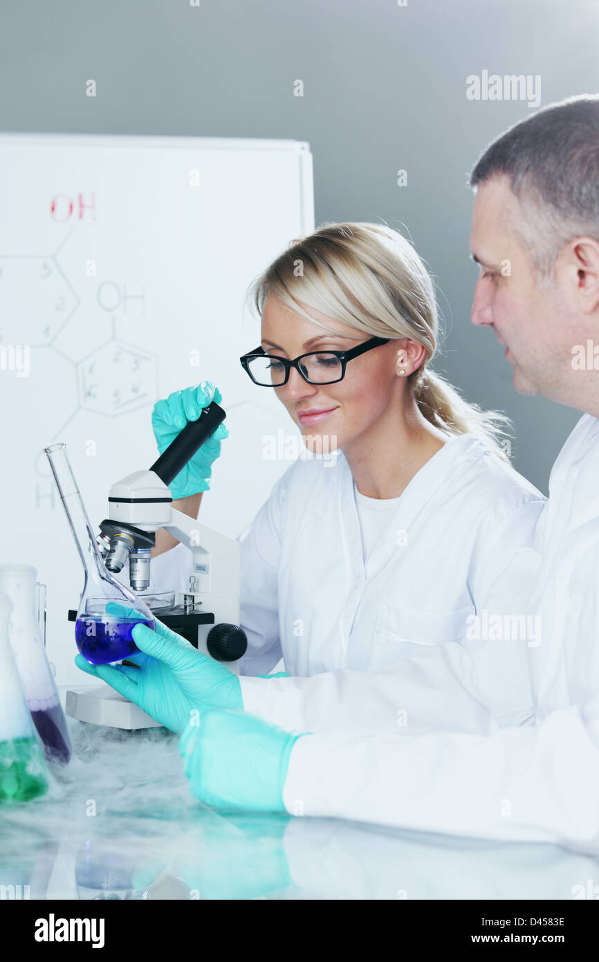 Chemistry Scientist conducting experiments in laboratory Stock Photo ...