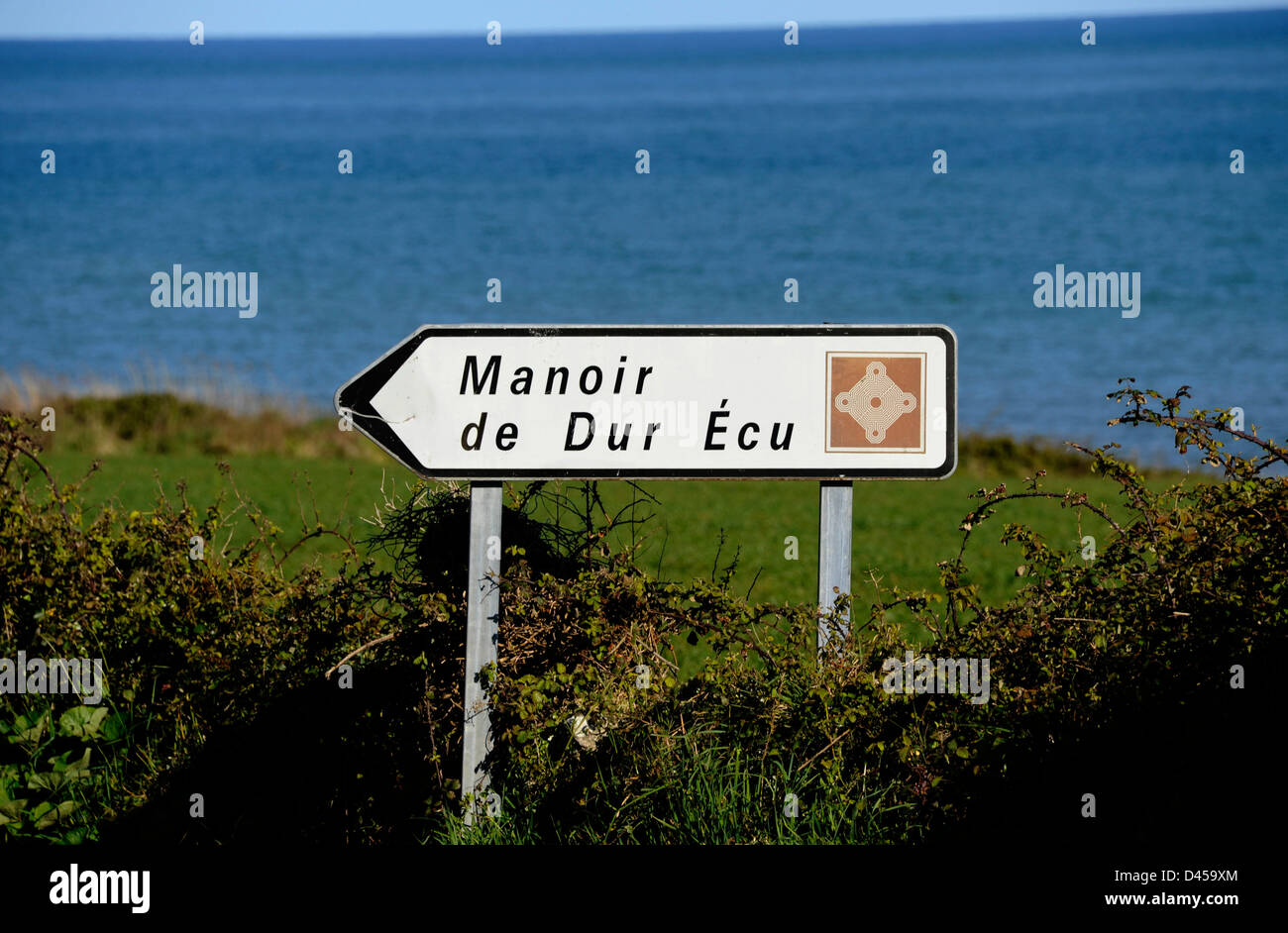 Sky blue manor road sign road sing urville nacqueville english channel ...