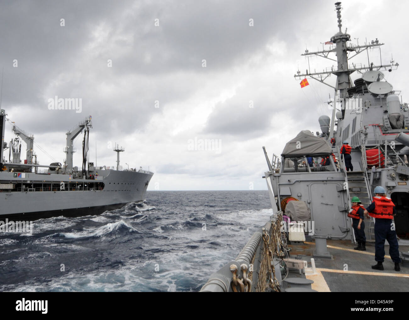 The guided-missile destroyer USS Laboon (DDG 58) conducts a ...