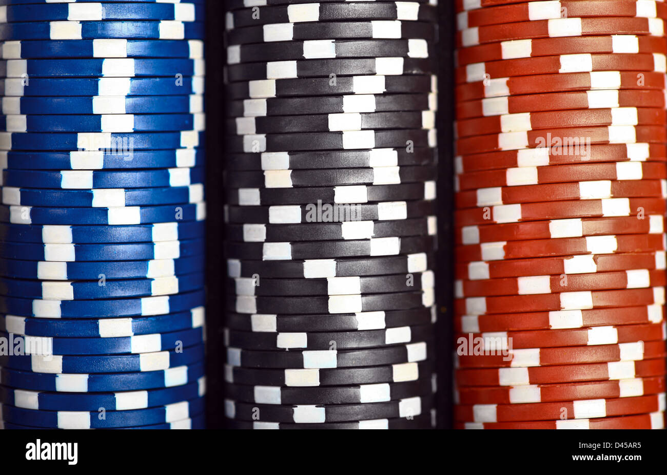 Color shot of a stack of various poker chips Stock Photo - Alamy