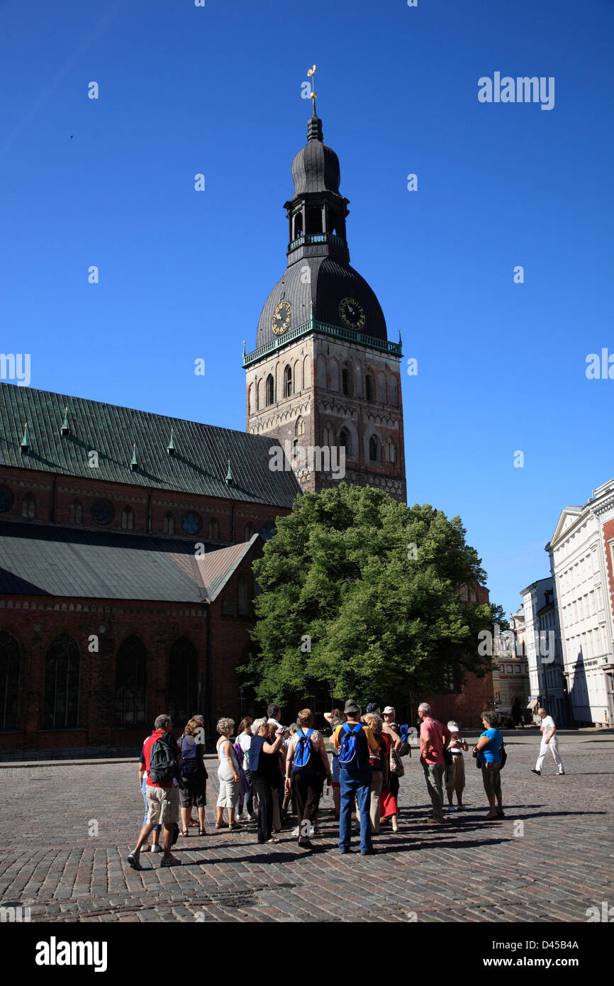 Tourist-Group at the Dome Cathedral in the main square Doma Laukums in ...
