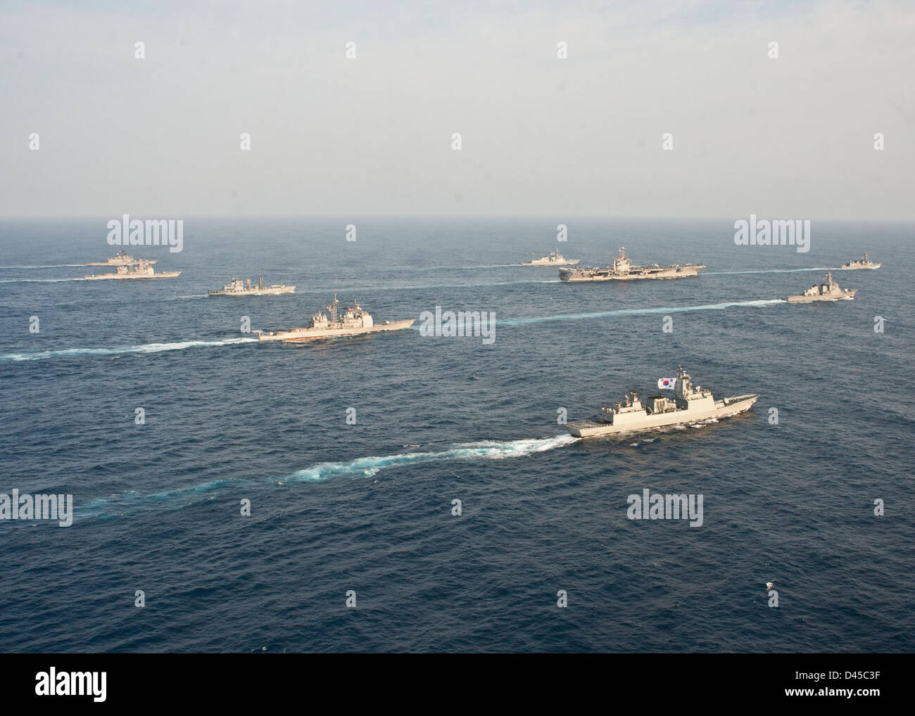 Ships from the USS George Washington Carrier Strike Group, the Japanese ...