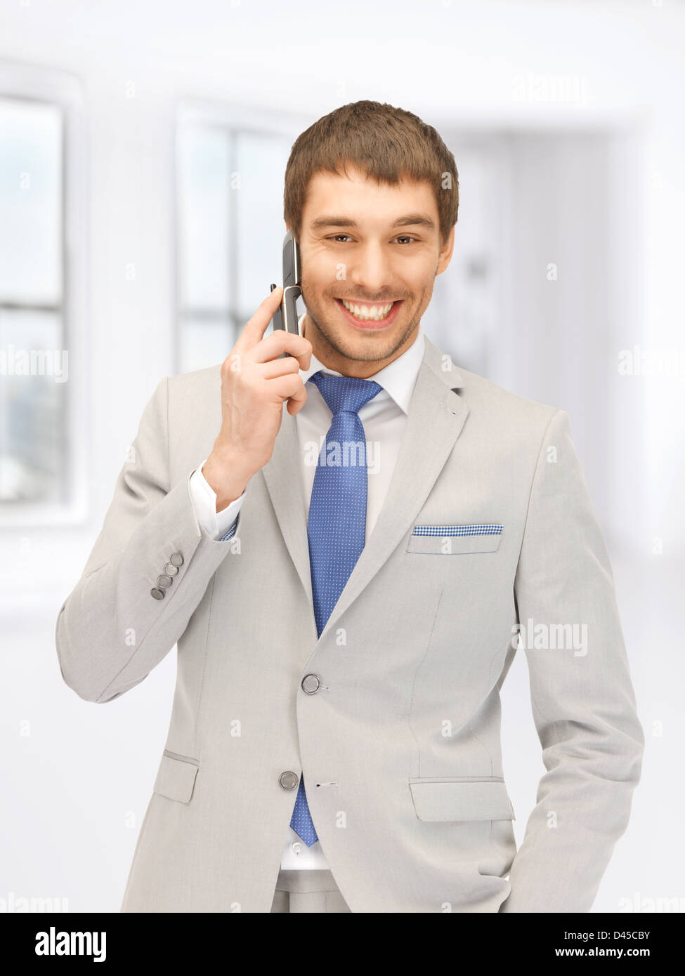 handsome man with cell phone Stock Photo - Alamy