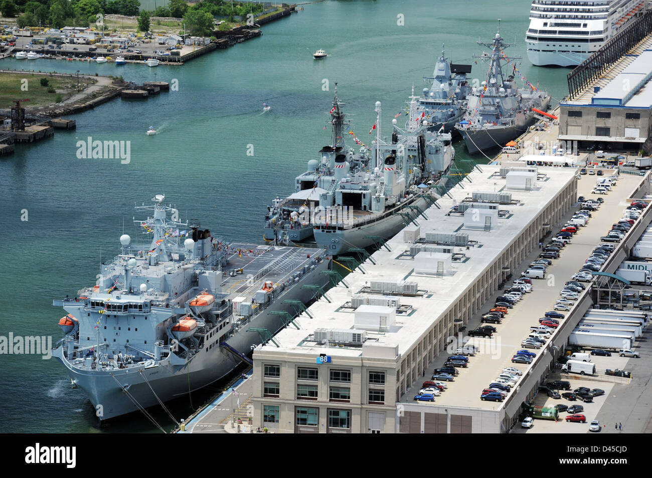 During Boston Navy Week, coalition ships are moored in Boston Harbor ...