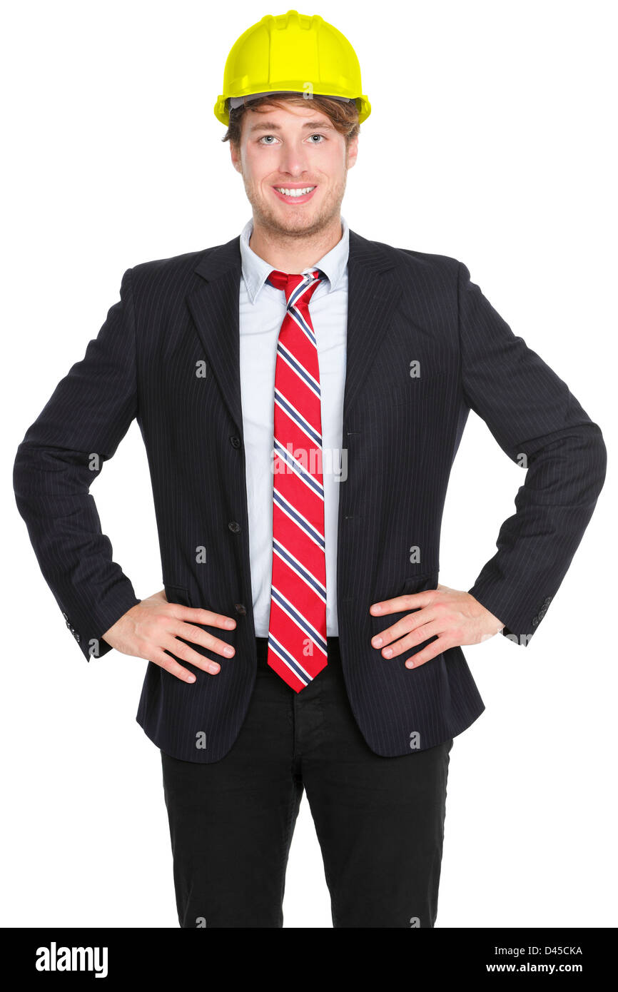 Portrait of confident young male engineer or architect in suit wearing ...