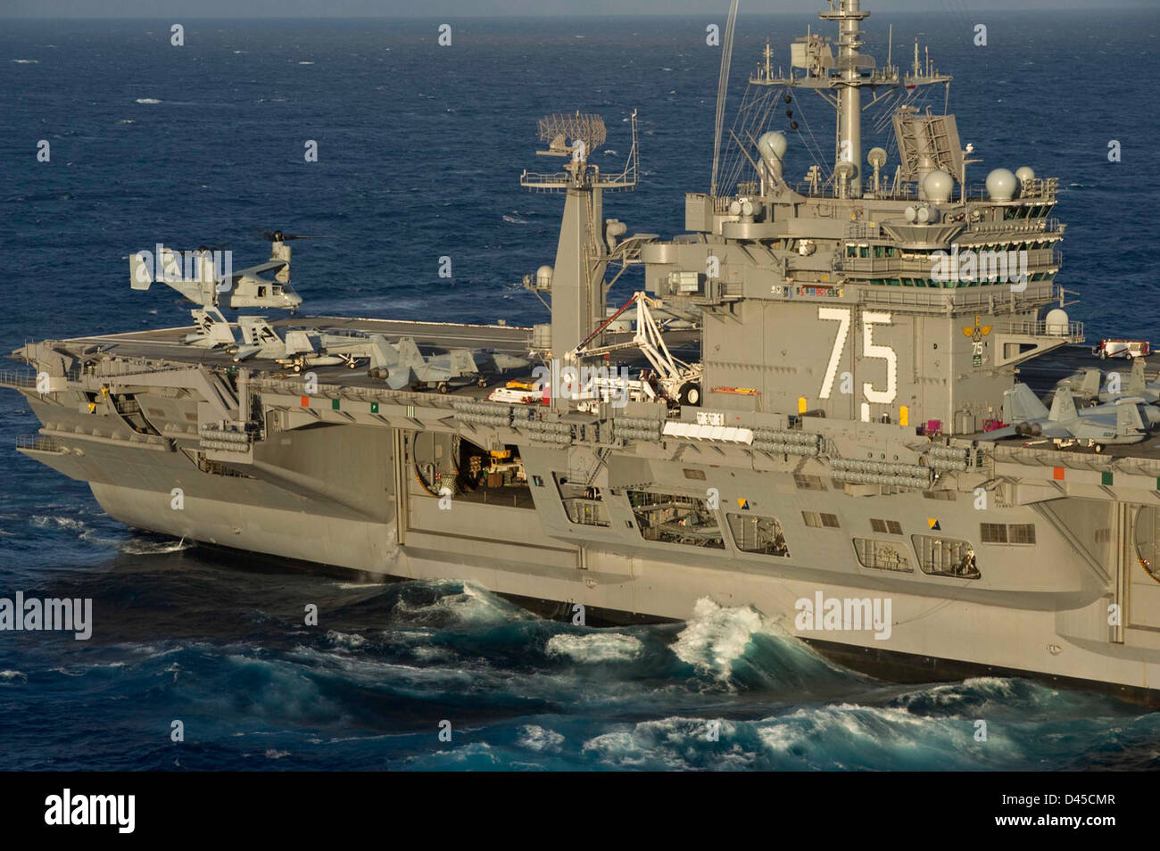 An MV-22 Osprey lands aboard a U.S. Navy vessel in the Atlantic Ocean ...