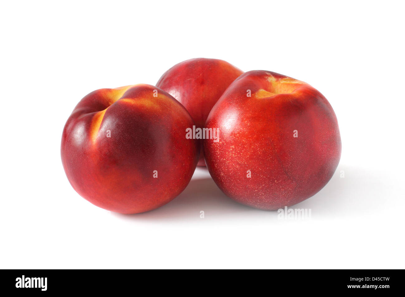 three peaches isolated on white Stock Photo - Alamy