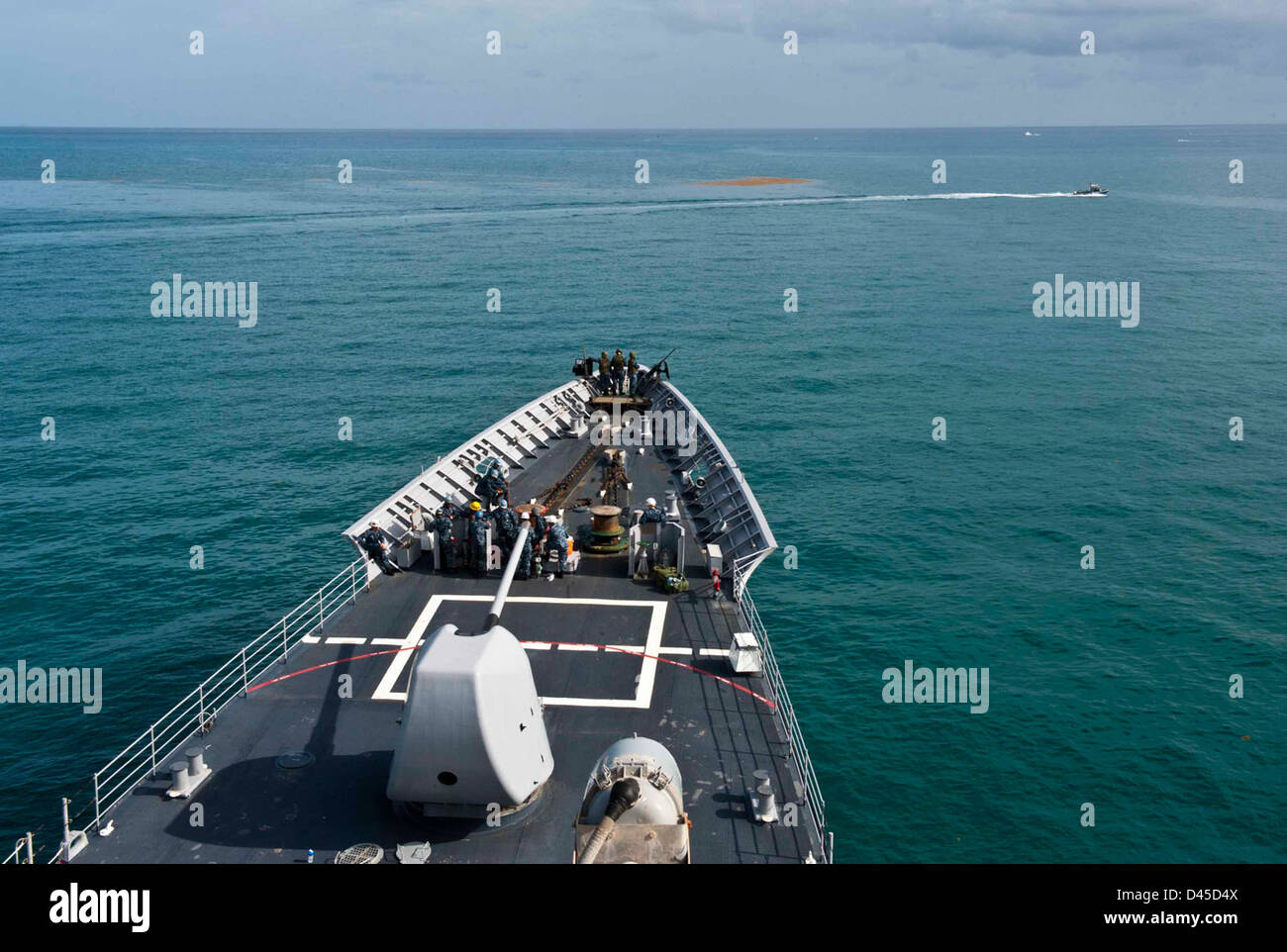 The USS Cape St. George transits the Florida Keys, conducting naval ...