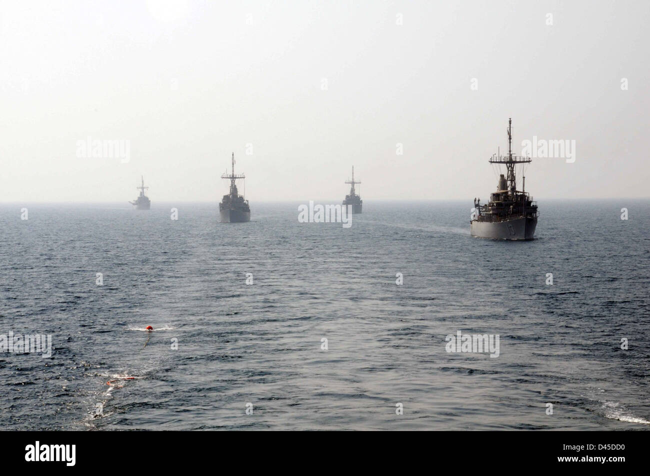 Navy ships maneuver for an astern replenishment at sea in the U.S. 5th ...